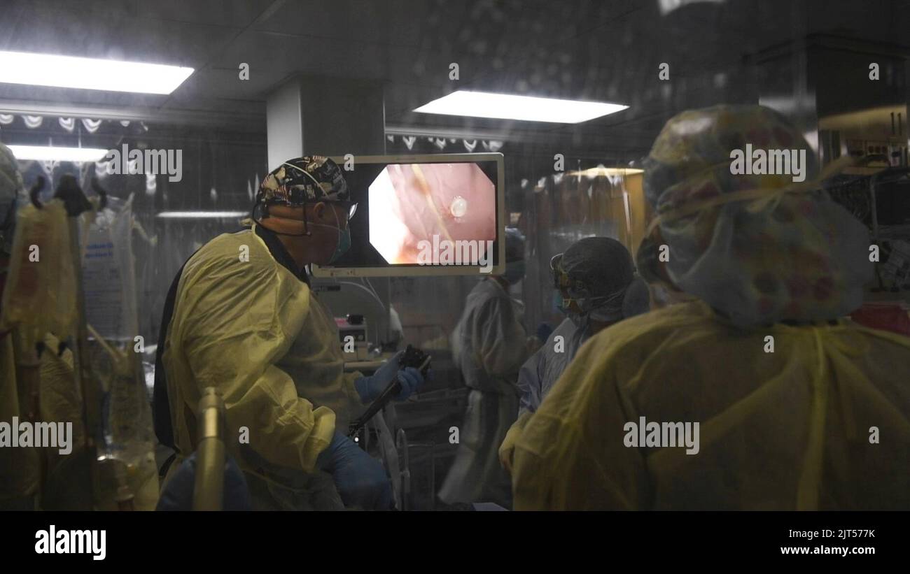 U.S. Navy Doctors, Nurses and Corpsmen Treat Patients in the ICU Aboard ...