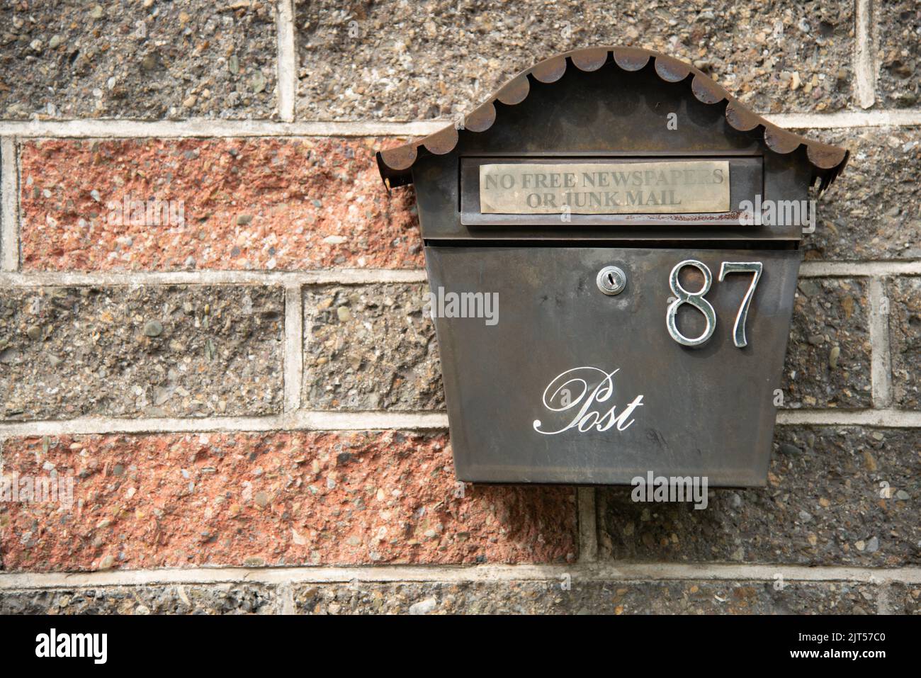 mailbox mounted on the outside of the building Stock Photo - Alamy