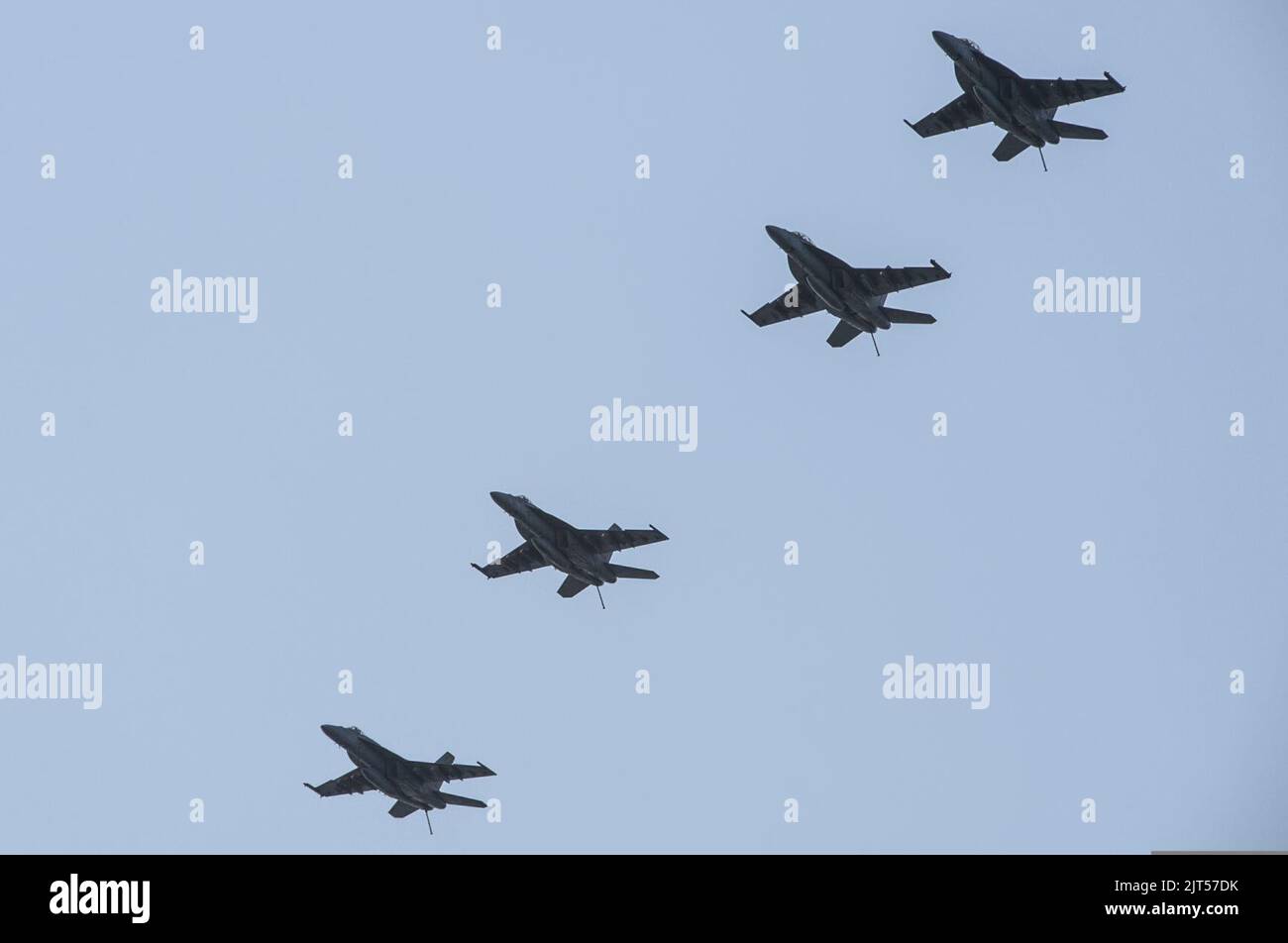 U.S. Navy F-A-18E-F Super Hornet aircraft fly over the aircraft carrier ... U.S. Navy F-A-18E-F Super Hornet aircraft fly over the aircraft carrier ...