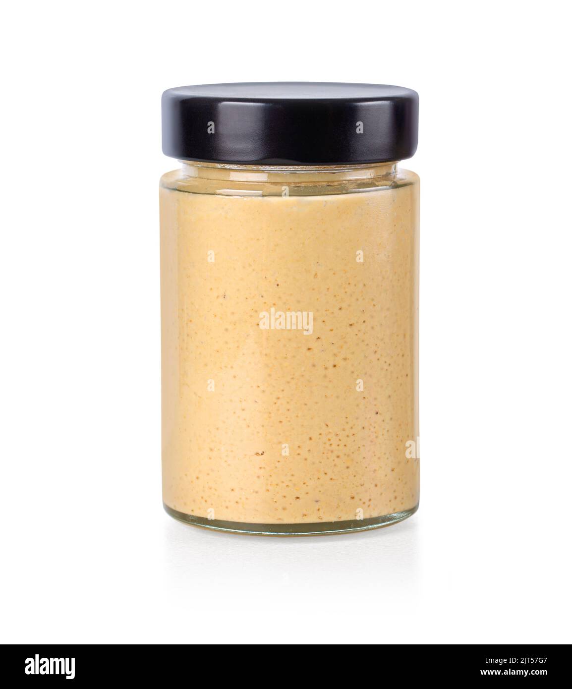 glass jar with peanut paste with black lid isolated on white background ...