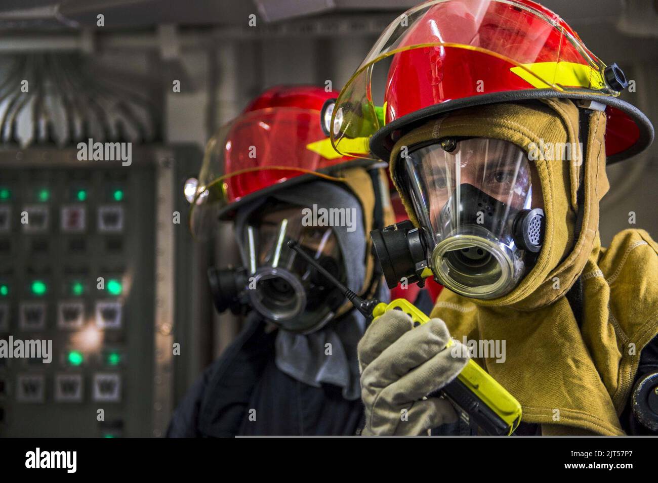 U.S. Navy Hull Maintenance Technician 2nd Class assigned to the guided ...