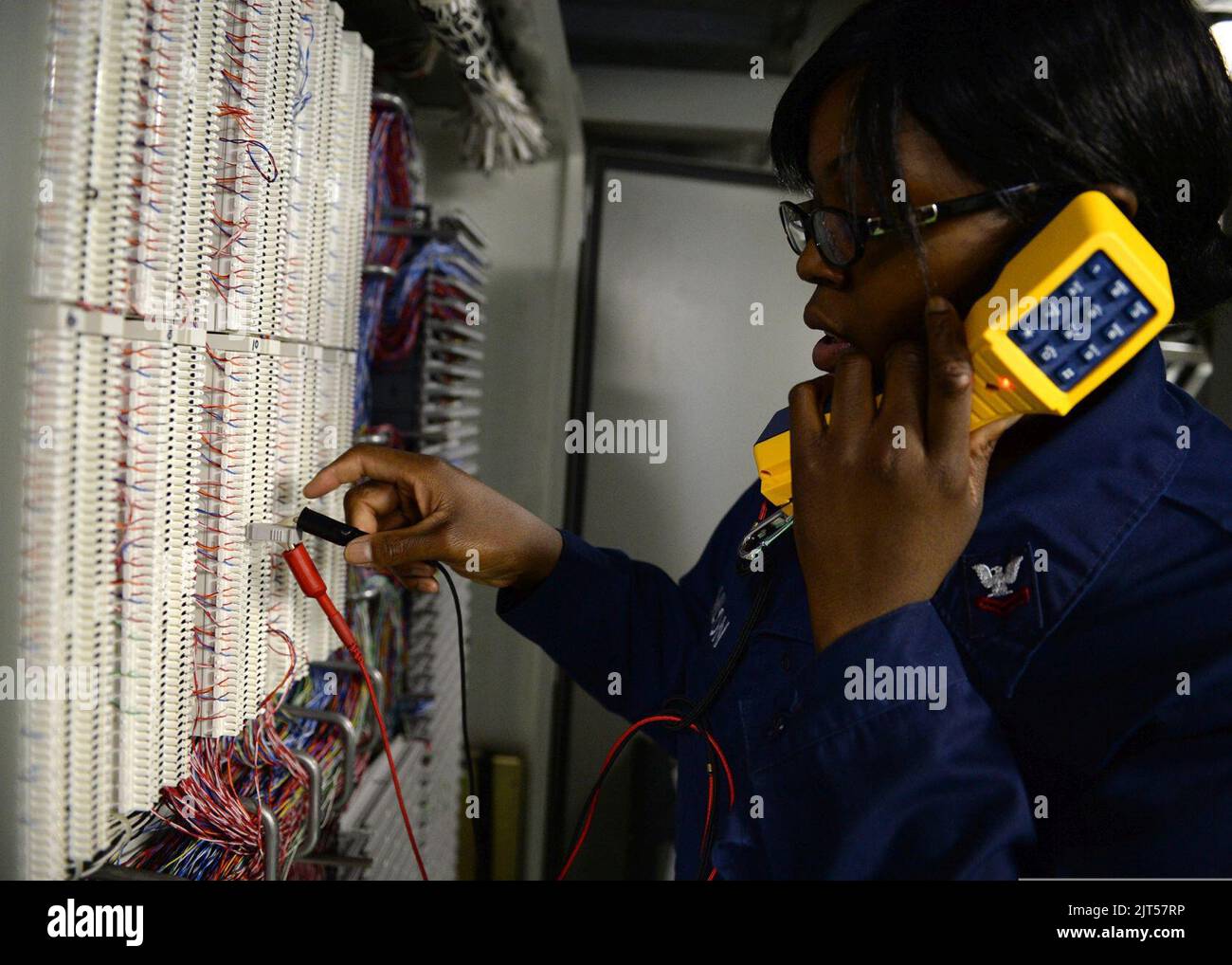 U.S. Navy Interior Communications Electrician 2nd Class assigned to the ...