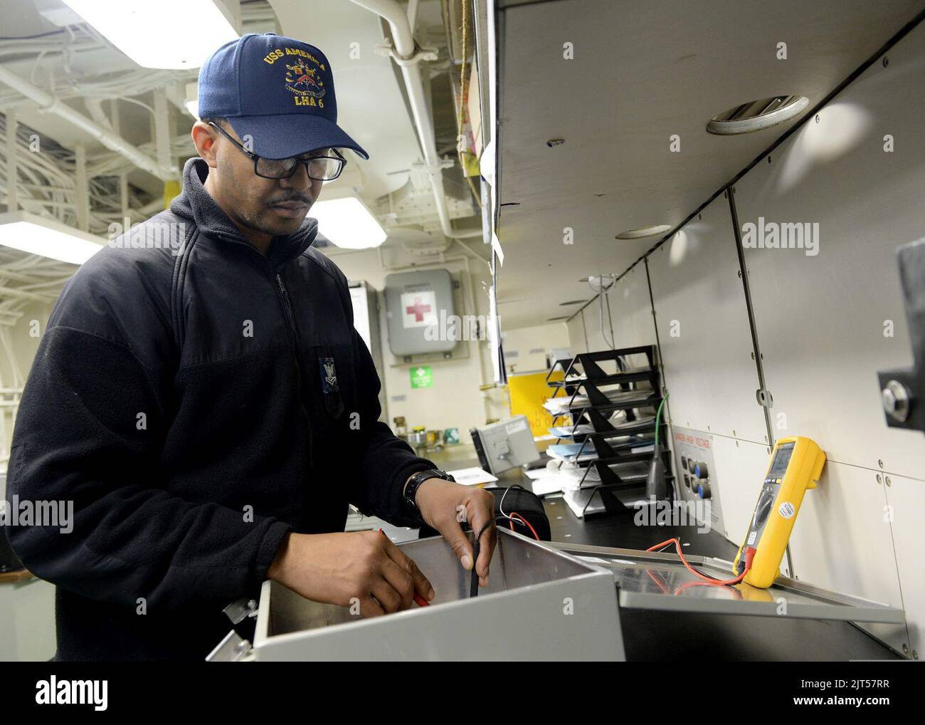 U.S. Navy Interior Communications Electrician 2nd Class assigned to the ...