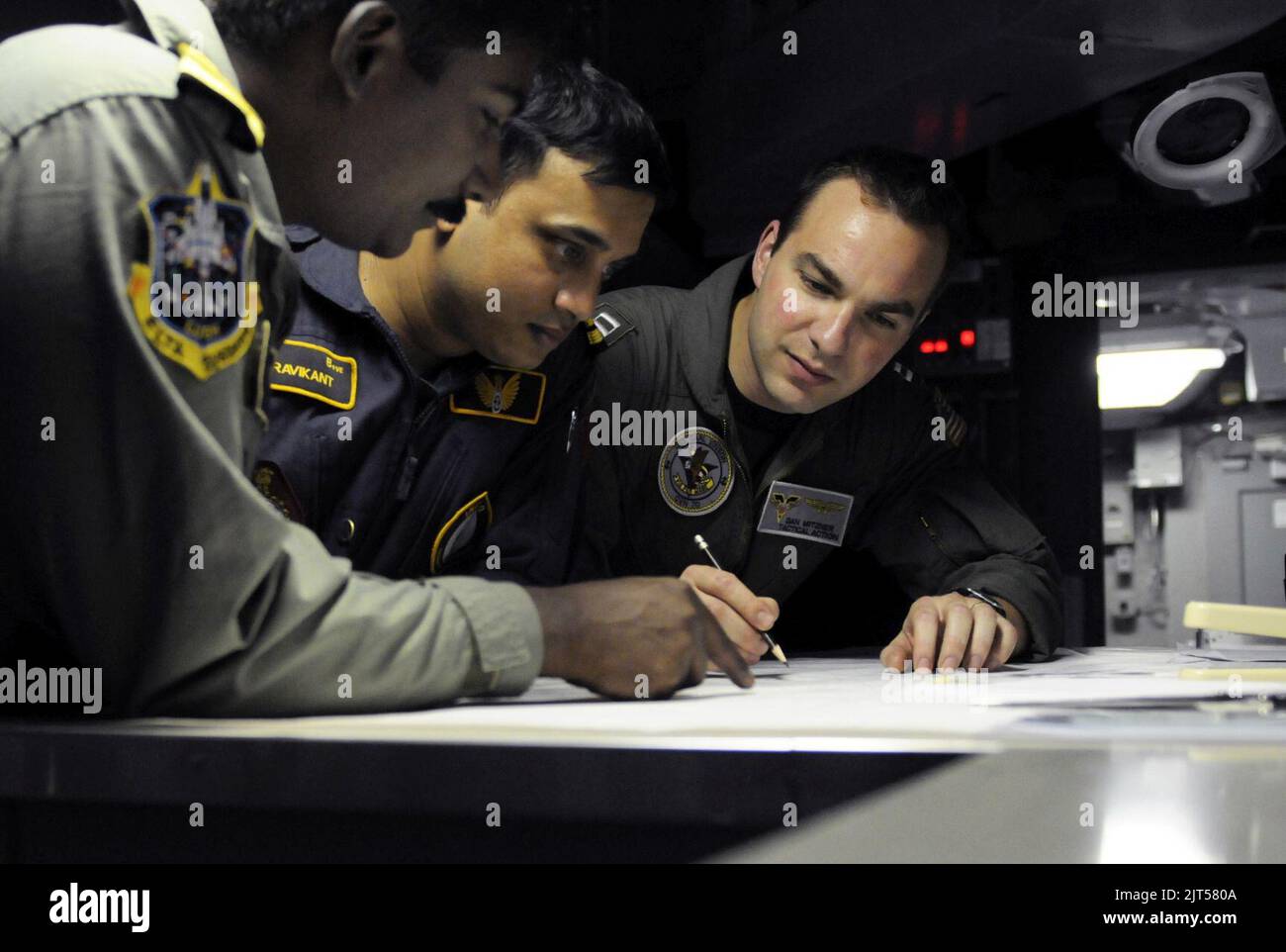 U.S. Navy Lt. reviews an exercise scenario in the undersea warfare ...