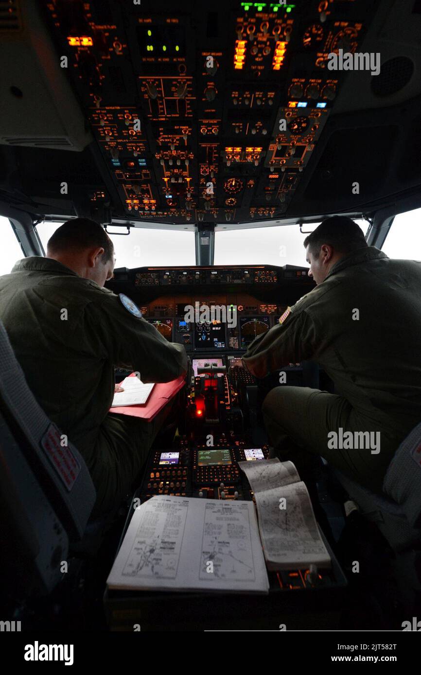 U.S. Navy Lt. j.g. left, and Lt. naval aviators assigned to Patrol ...