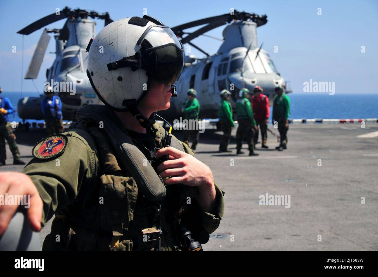 U.S. Navy Naval Air Crewman 2nd Class assigned to Helicopter Sea Combat ...