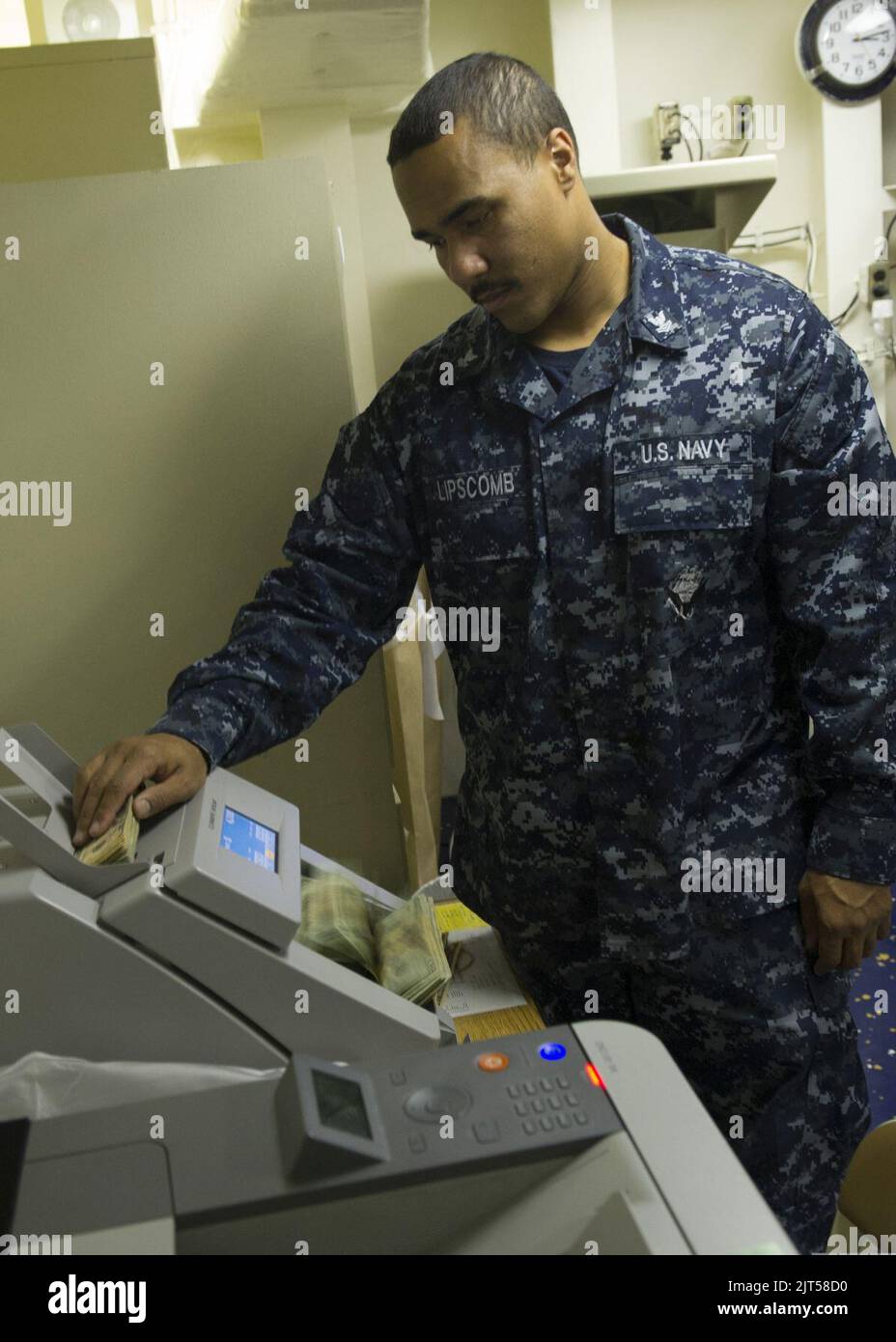 U.S. Navy Personnel Specialist 2nd Class left, assigned to the ...