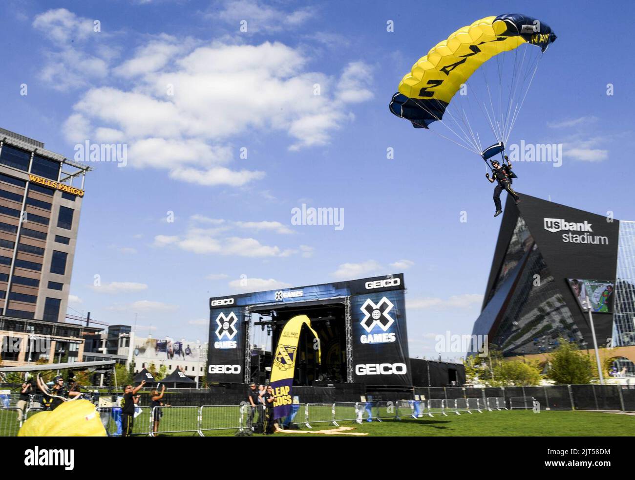 U.S. Navy parachute lands in Elliot Park during a skydiving ...