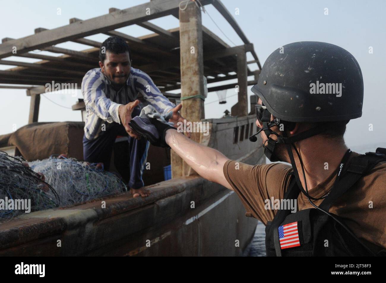 U.S. Navy Petty Officer 2nd Class a visit, board, search and seizure ...