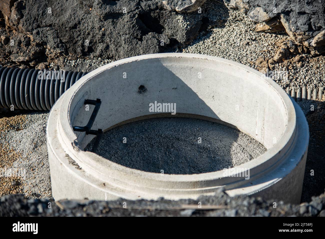 Concrete drainage manhole is unfinished on building site Stock Photo ...