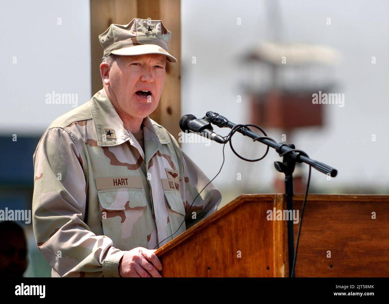 U.S. Navy Rear Adm. James Hart speaking about his tour as commander ...