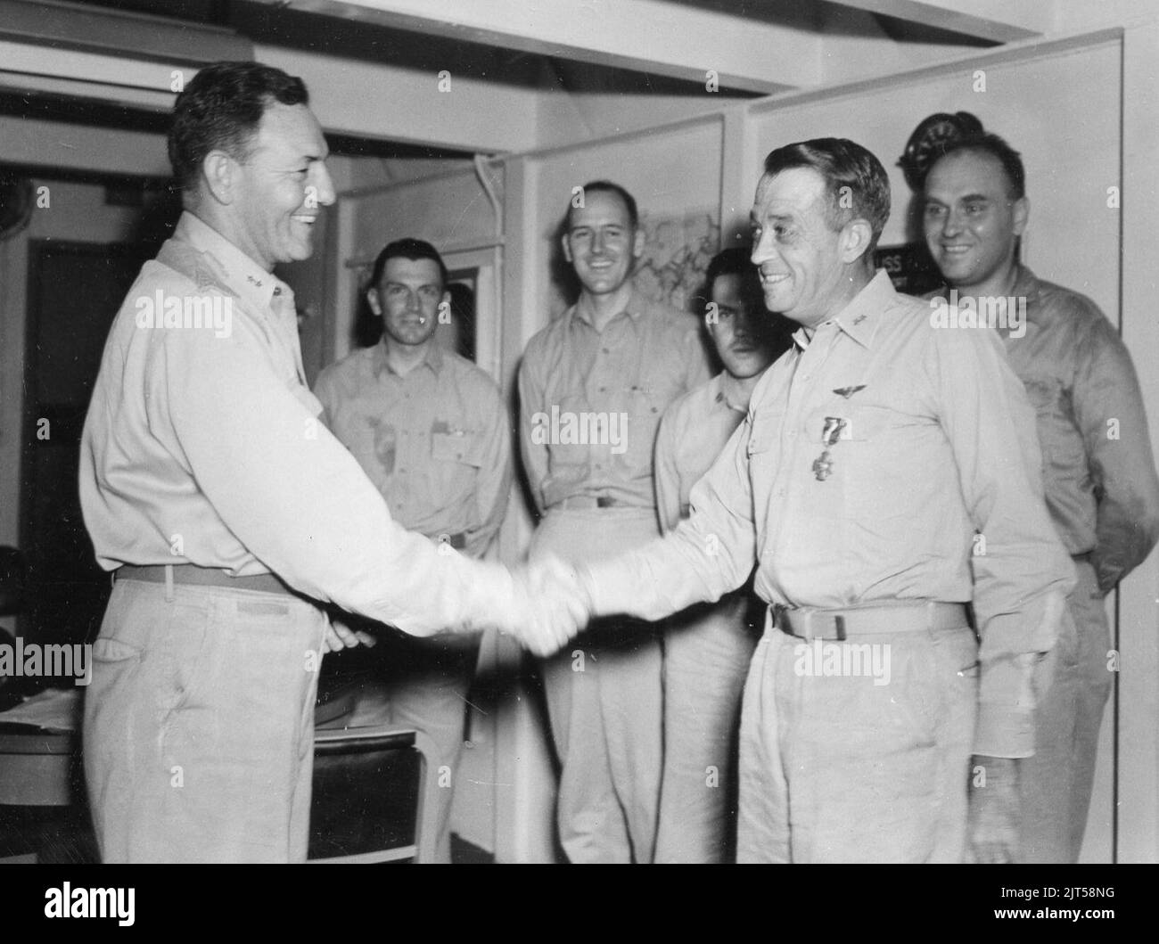 U.S. Navy Rear Admiral Calvin T. Durgin awards Rear Admiral Clifton ...