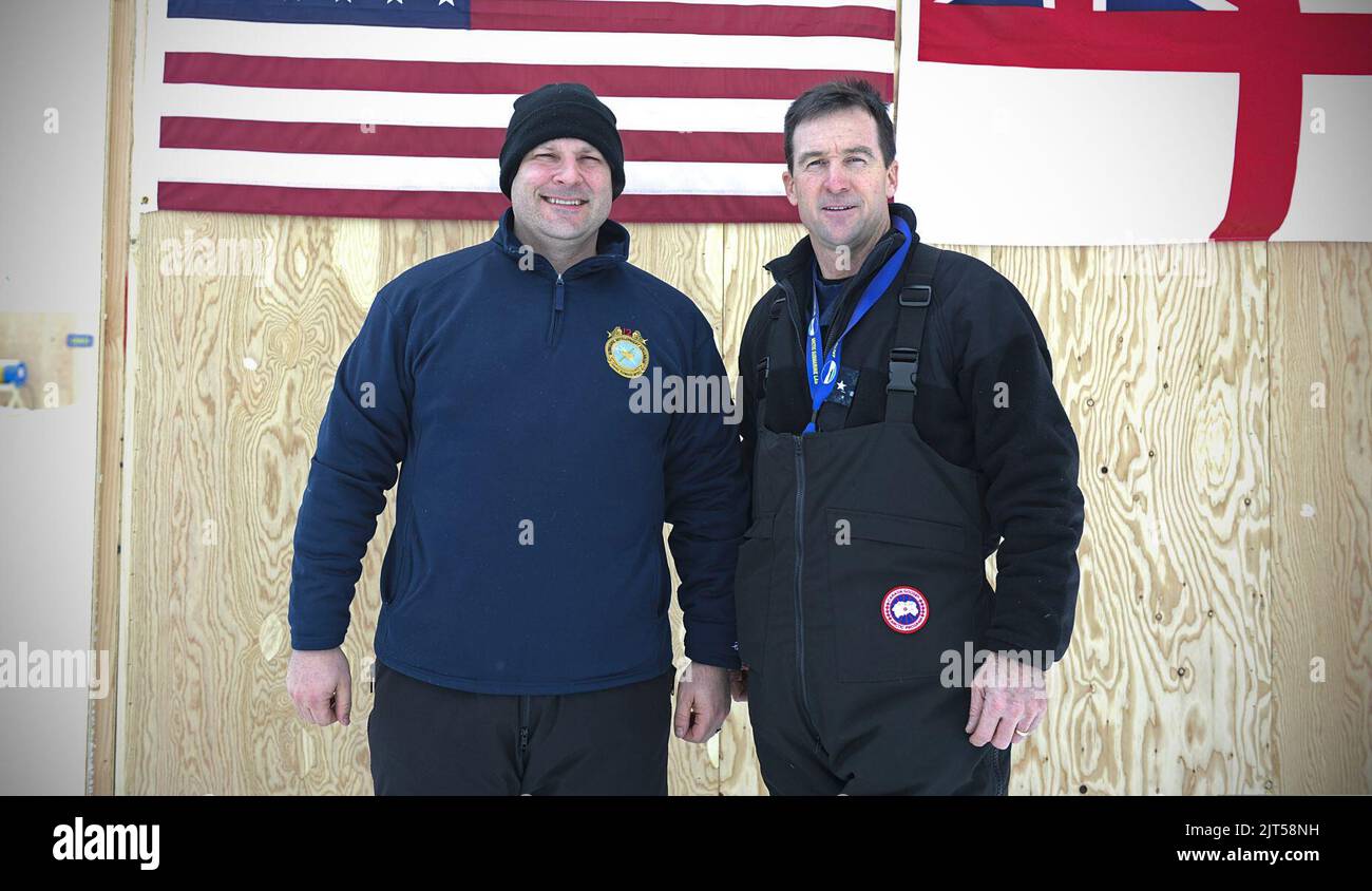 U.S. Navy Rear Adm. Ken Perry, right, the commander of Submarine Group ...