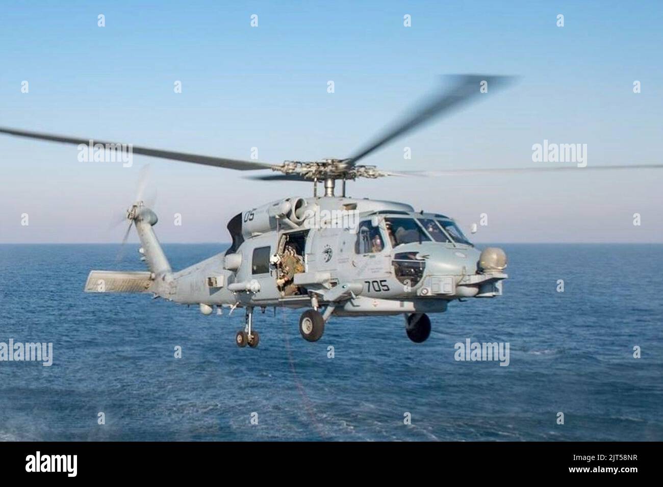 U.S. Navy sailors aboard USS STOCKDALE (DDG 106) conduct a helicopter ...
