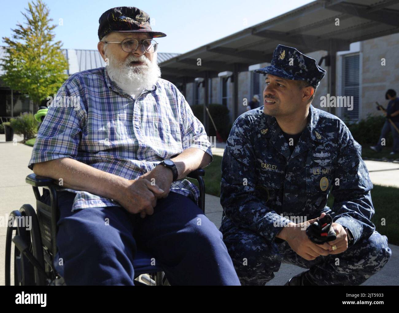 U.S. Navy Senior Chief Petty Officer Sonar Technician (Surface) right ...