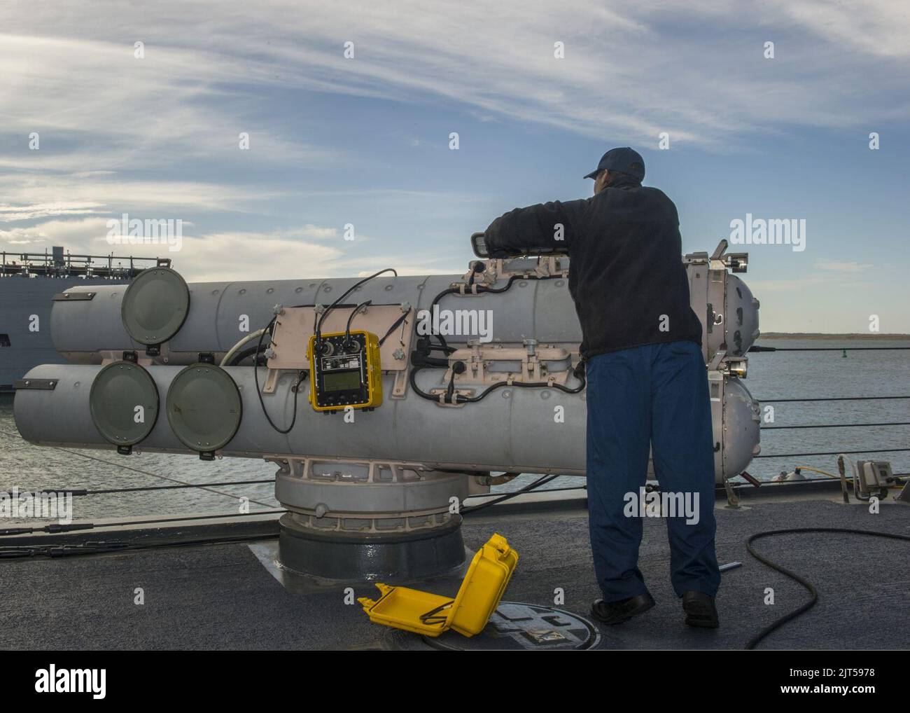 U.S. Navy Sonar Technician 3rd Class performs maintenance on a surface ...
