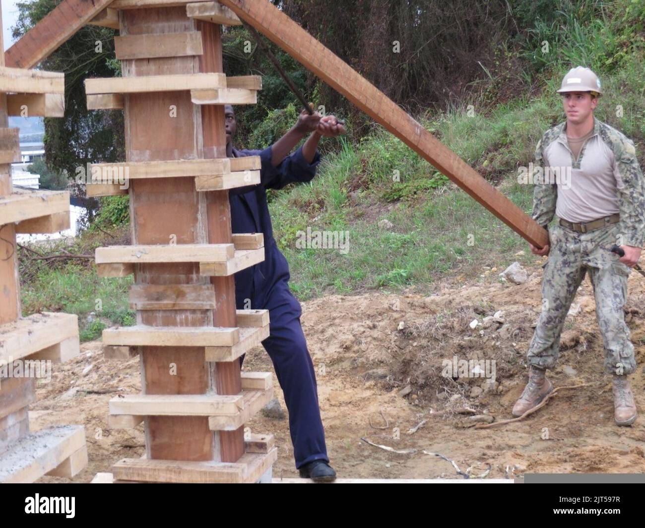 U.S. Navy Steelworker Constructionman assigned to Naval Mobile ...