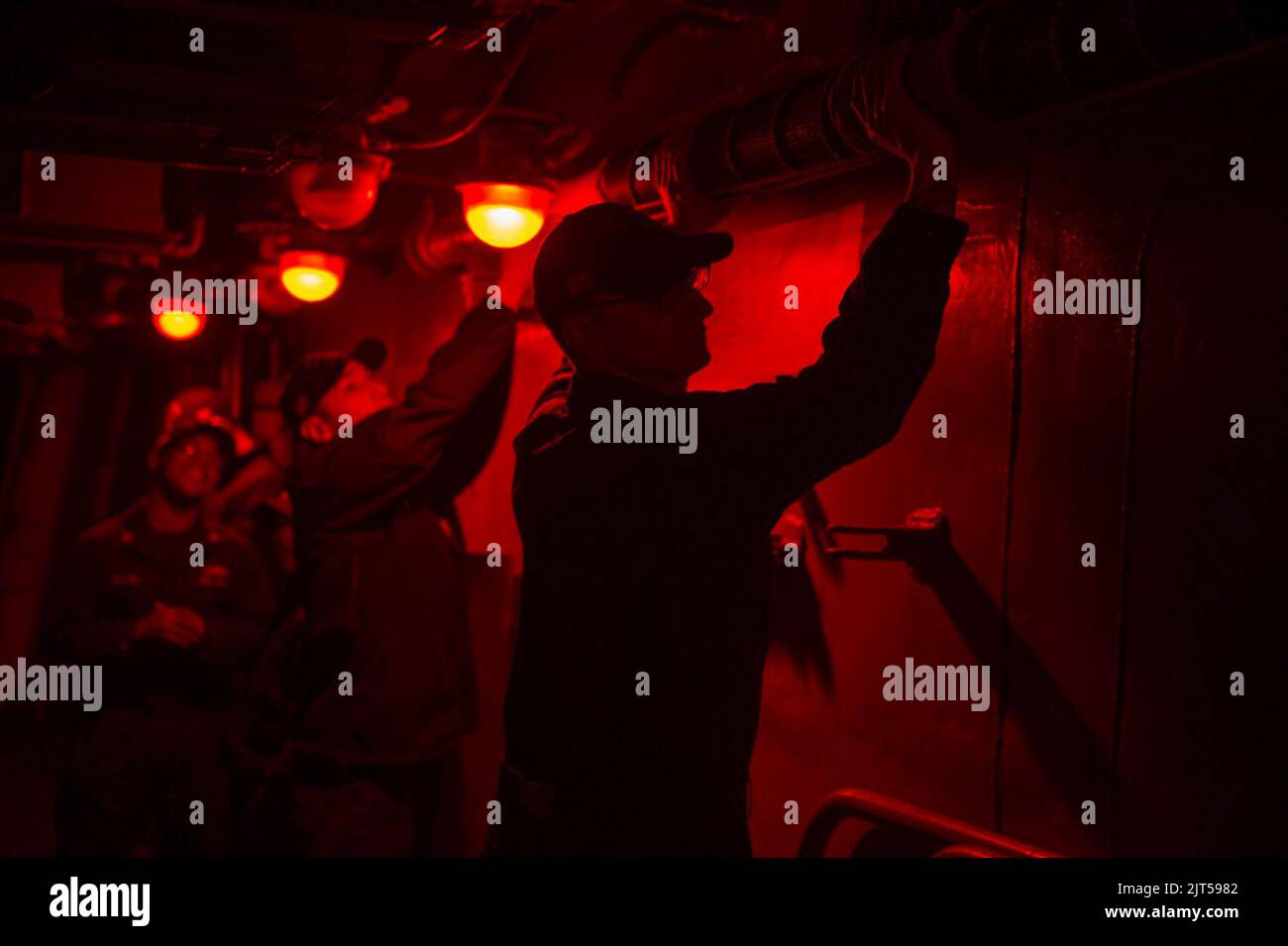 U.S. Navy Sonar Technician 2nd Class right, and Fire Controlman 3rd ...