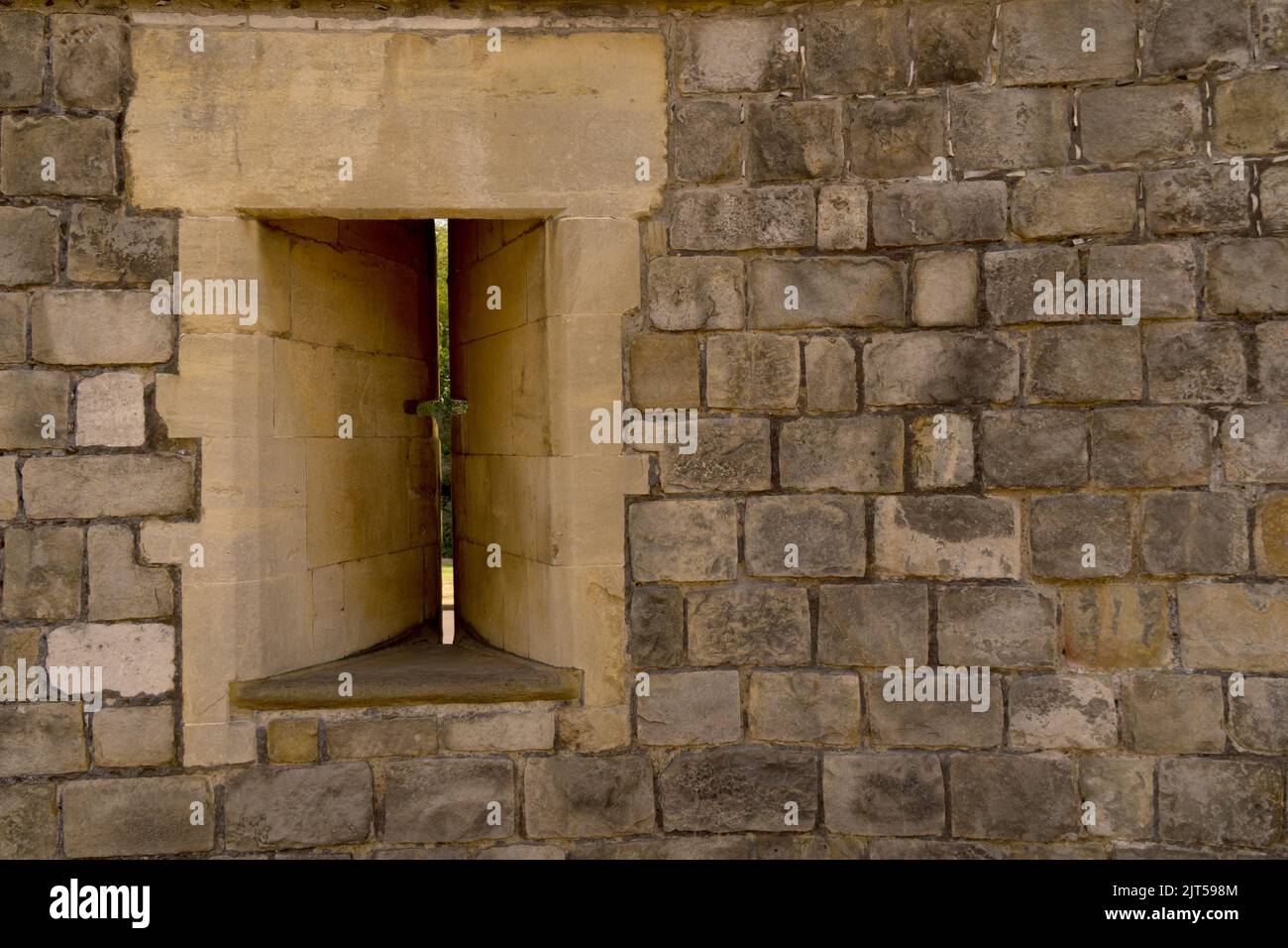 Close up detail of massive medieval tower castle stone wall with ...
