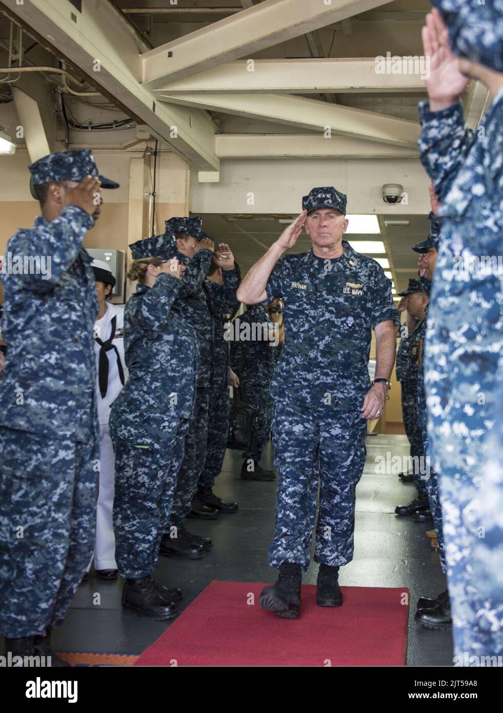 U.S. Navy Vice Adm. Matthew L. Nathan, center, the surgeon general of ...