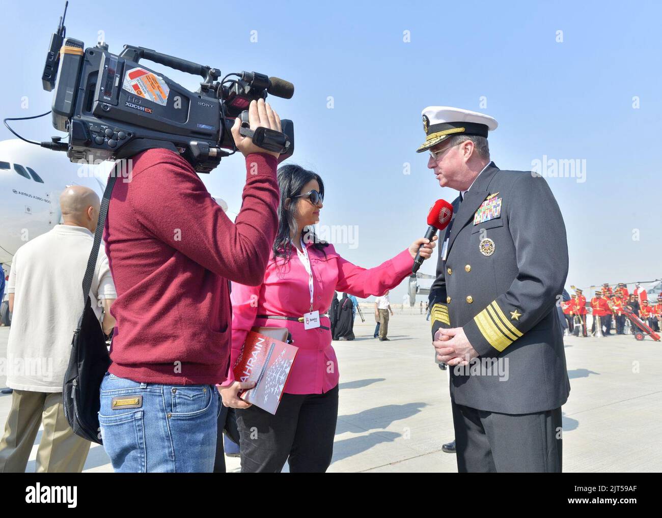 U.S. Navy Vice Adm. John W. Miller, right, the commander of U.S. Naval ...
