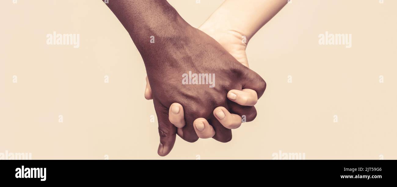 White Woman, African man Holding Hand Friendship Symbol. African Peace ...