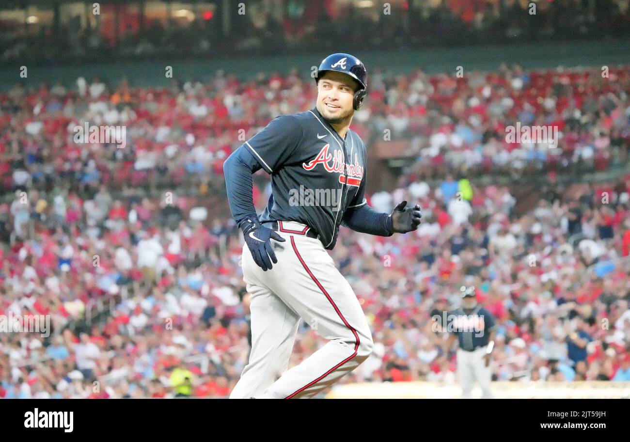Atlanta Braves Travis D'Arnaud looks back at his third base coach after hitting a three run home ...