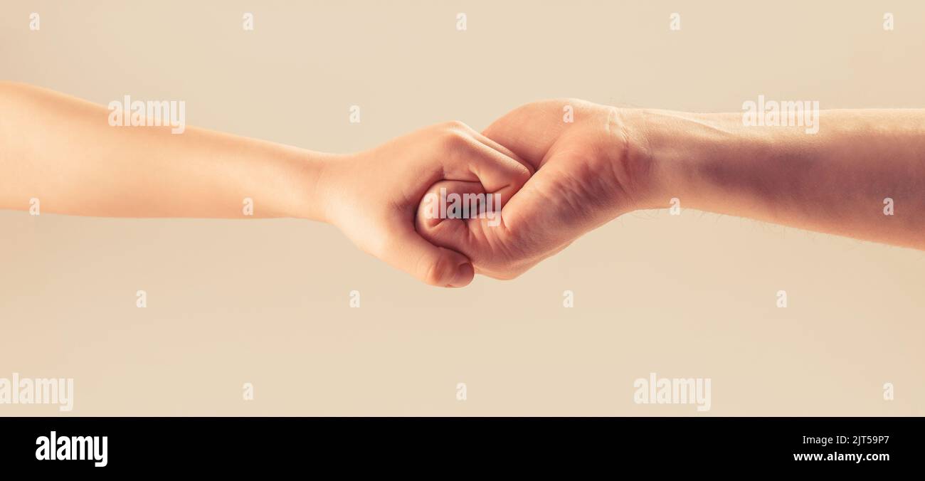 Friendly handshake, friends greeting. Rescue, helping hand. Man help ...