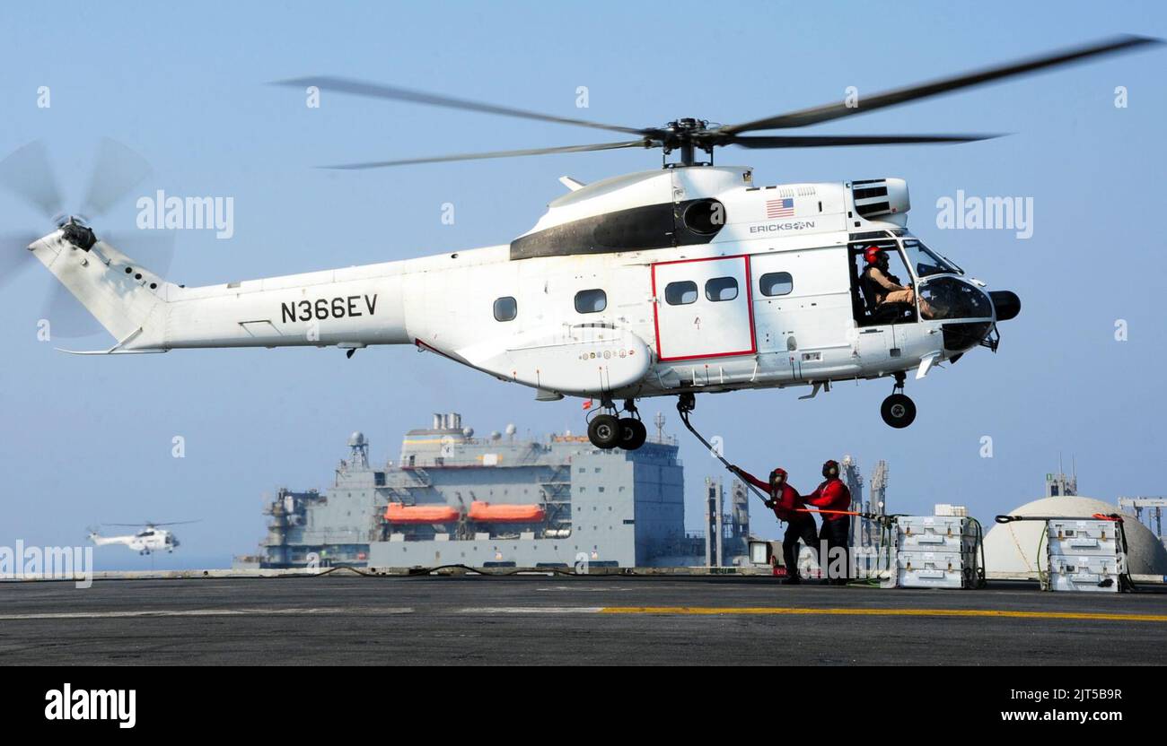 U.S. Sailors aboard the aircraft carrier USS George H.W. Bush (CVN 77 ...