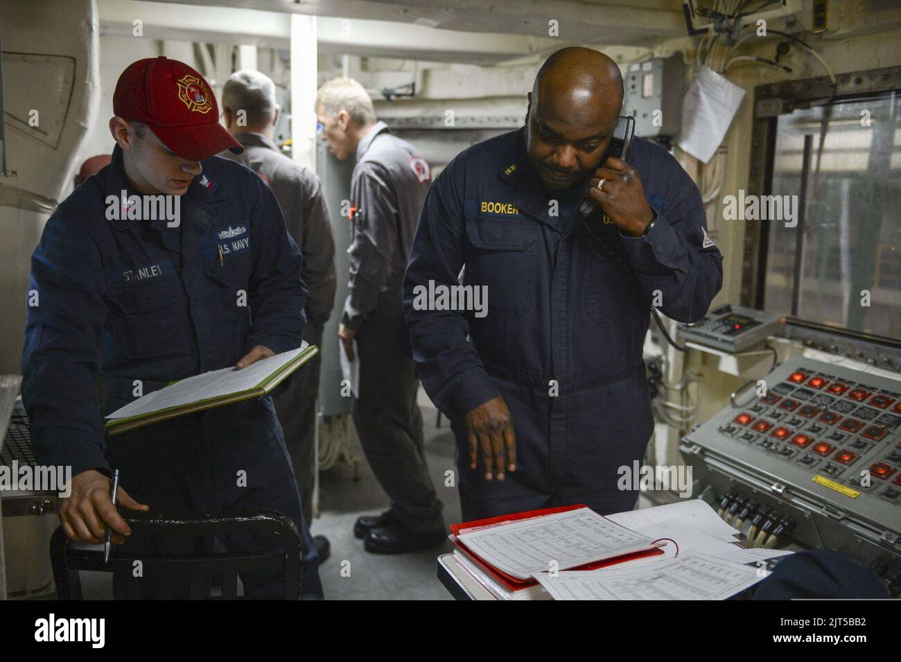 U.S. Sailors aboard the amphibious transport dock ship USS Mesa Verde ...