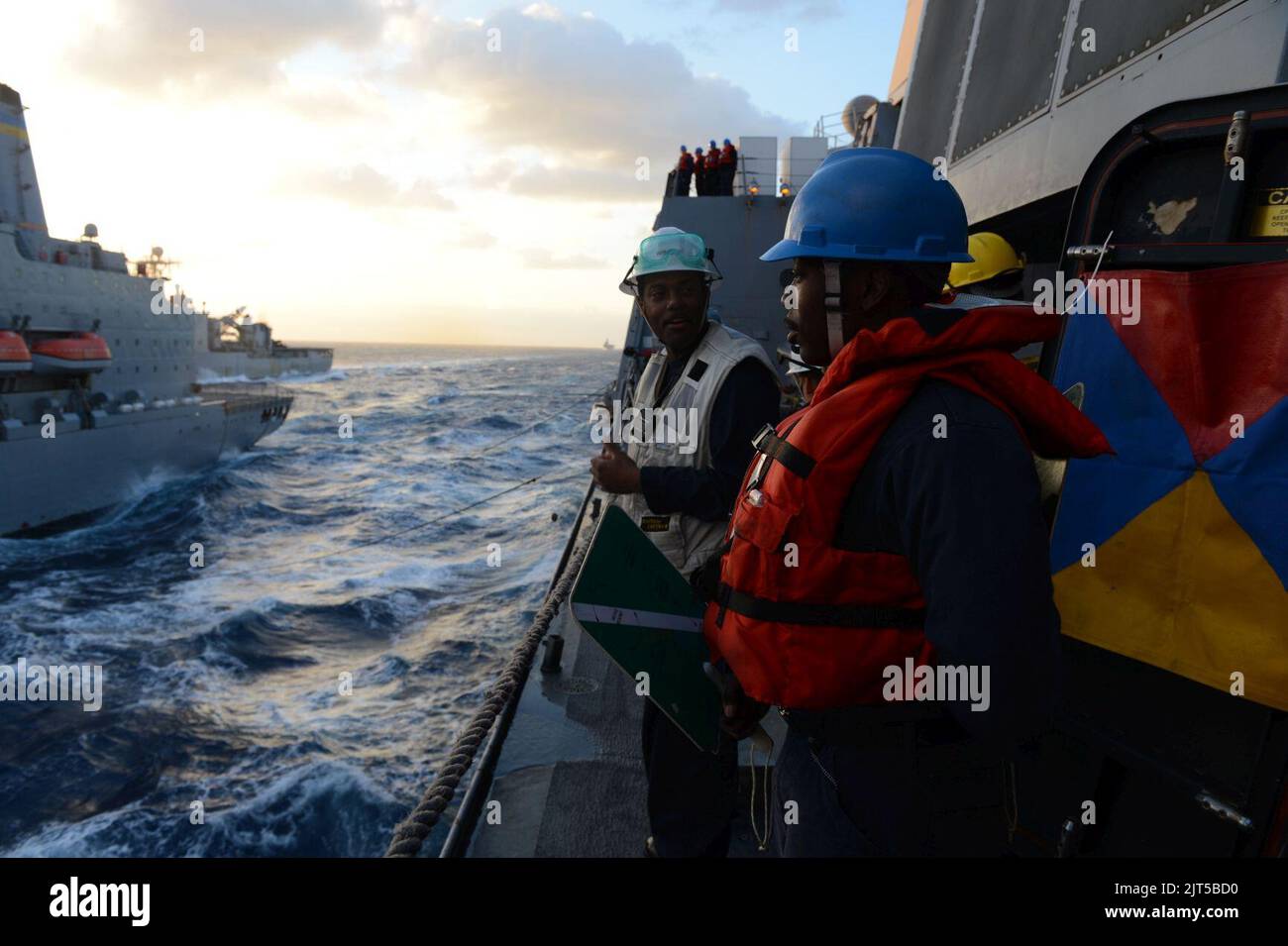 U.S. Sailors aboard the amphibious transport dock ship USS Mesa Verde ...