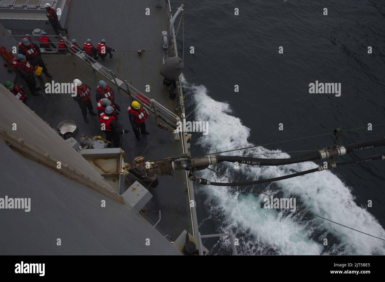 U.S. Sailors aboard the guided missile destroyer USS Curtis Wilbur (DDG ...