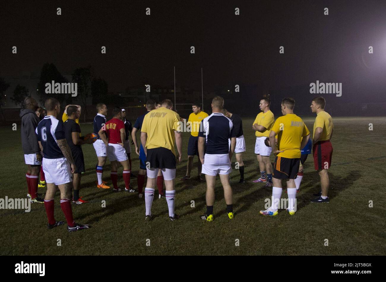 U.S. Sailors and Marines assigned to the amphibious assault ship USS ...