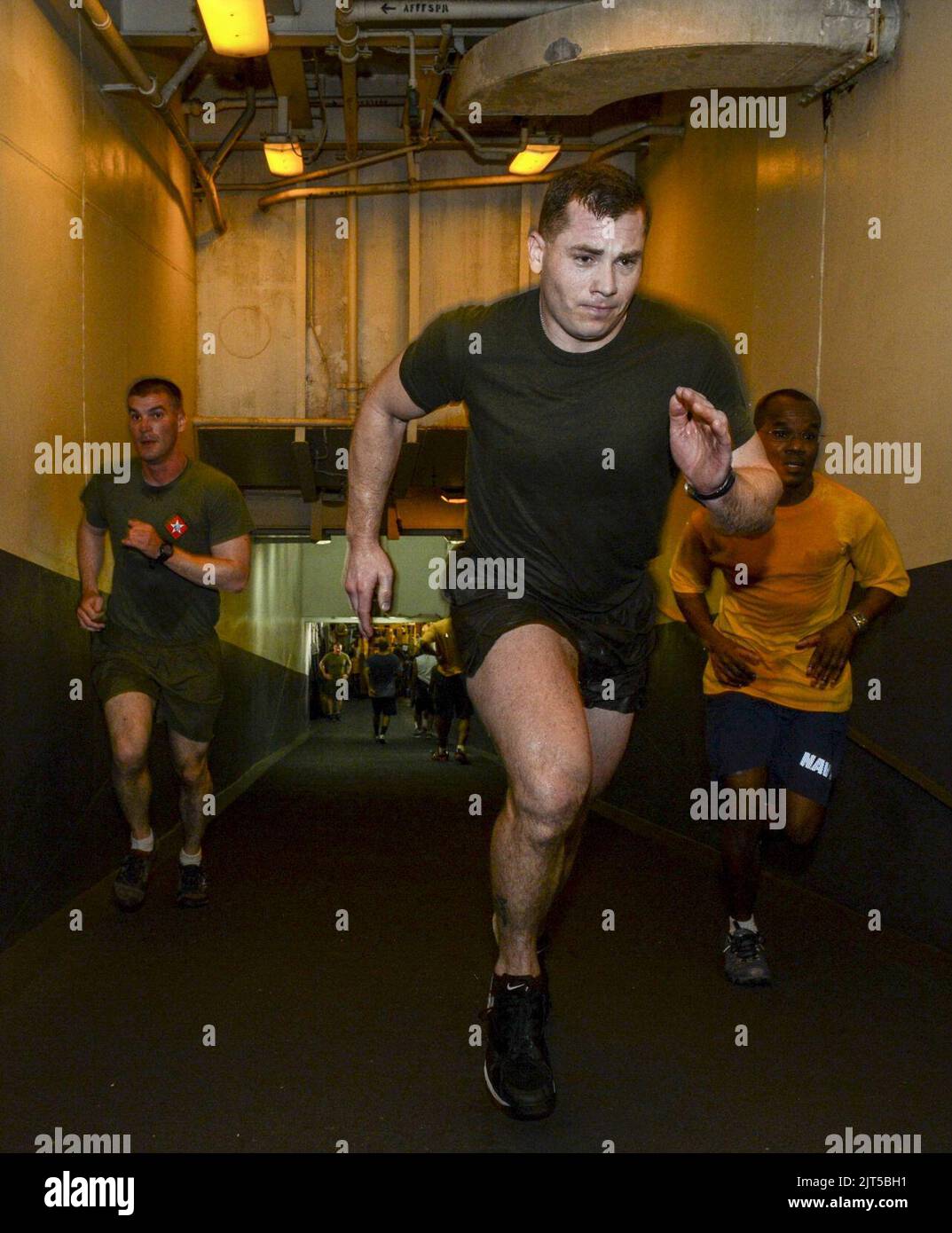 U.S. Sailors and Marines commemorate the Bataan Death March by running ...