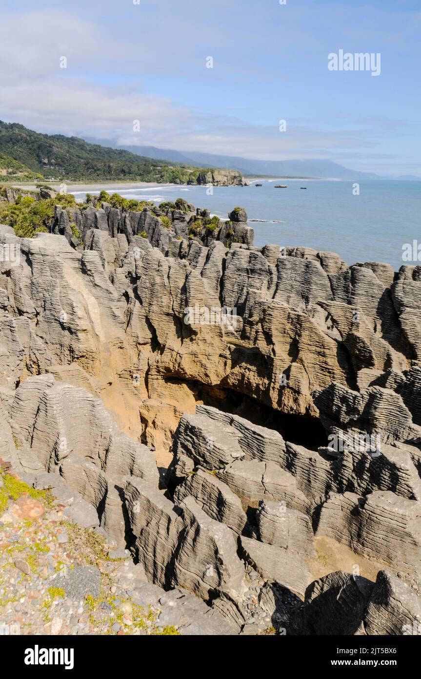 The high lime stoned pancake-shaped rocks blowholes and surge pools at ...