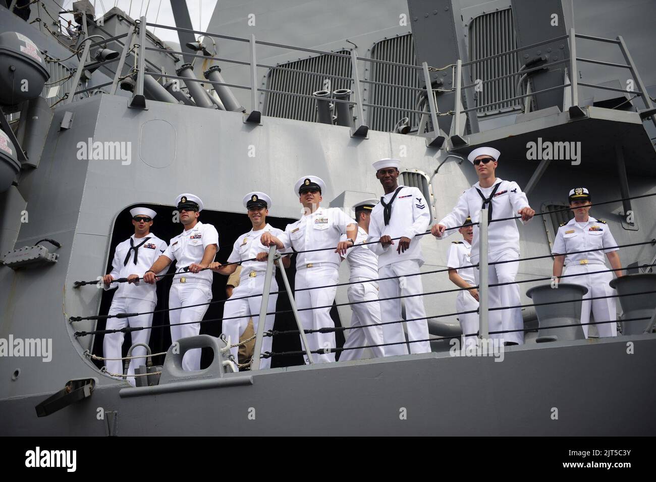 U.S. Sailors assigned to the guided-missile destroyer USS Michael ...