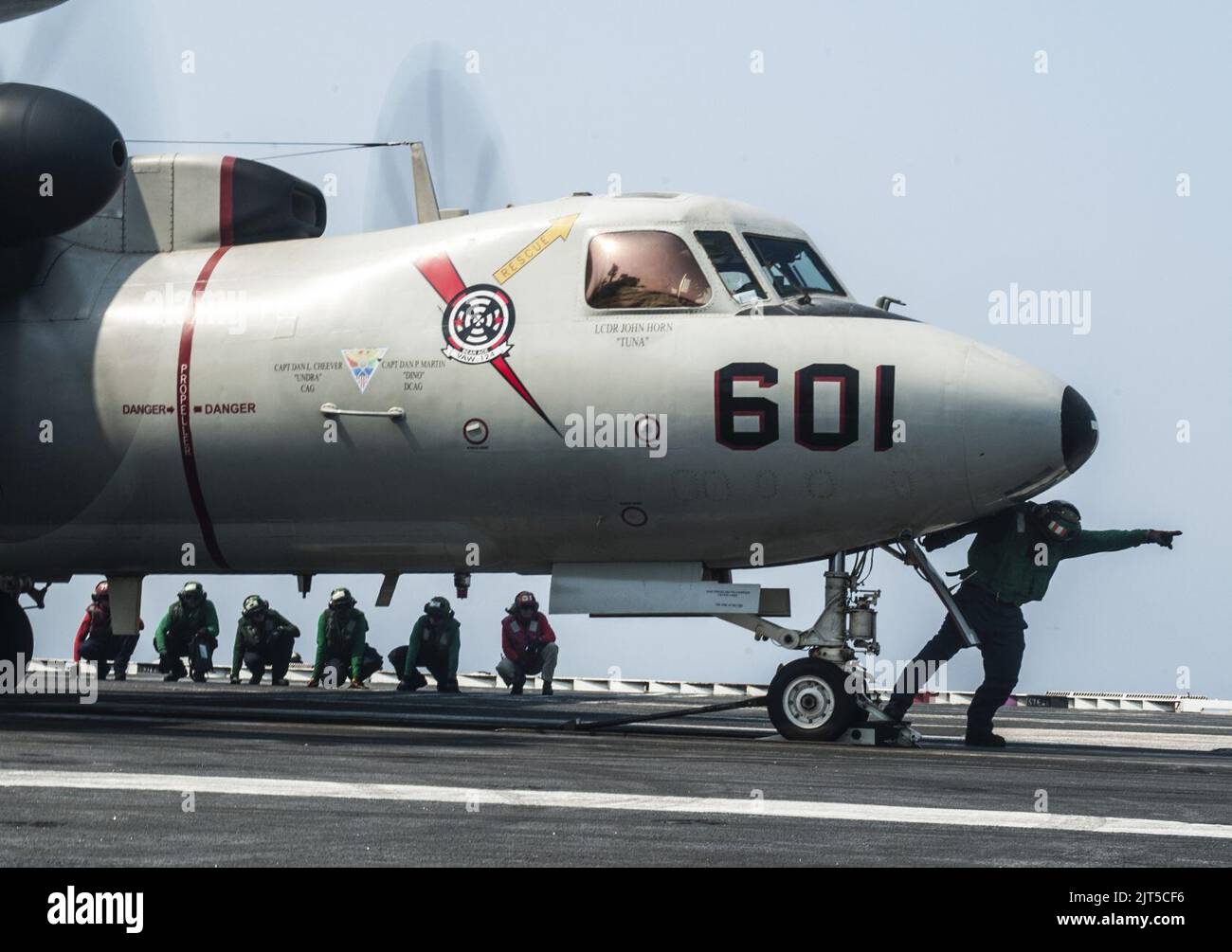 U.S. Sailors prepare to launch an E-2C Hawkeye assigned to Carrier ...