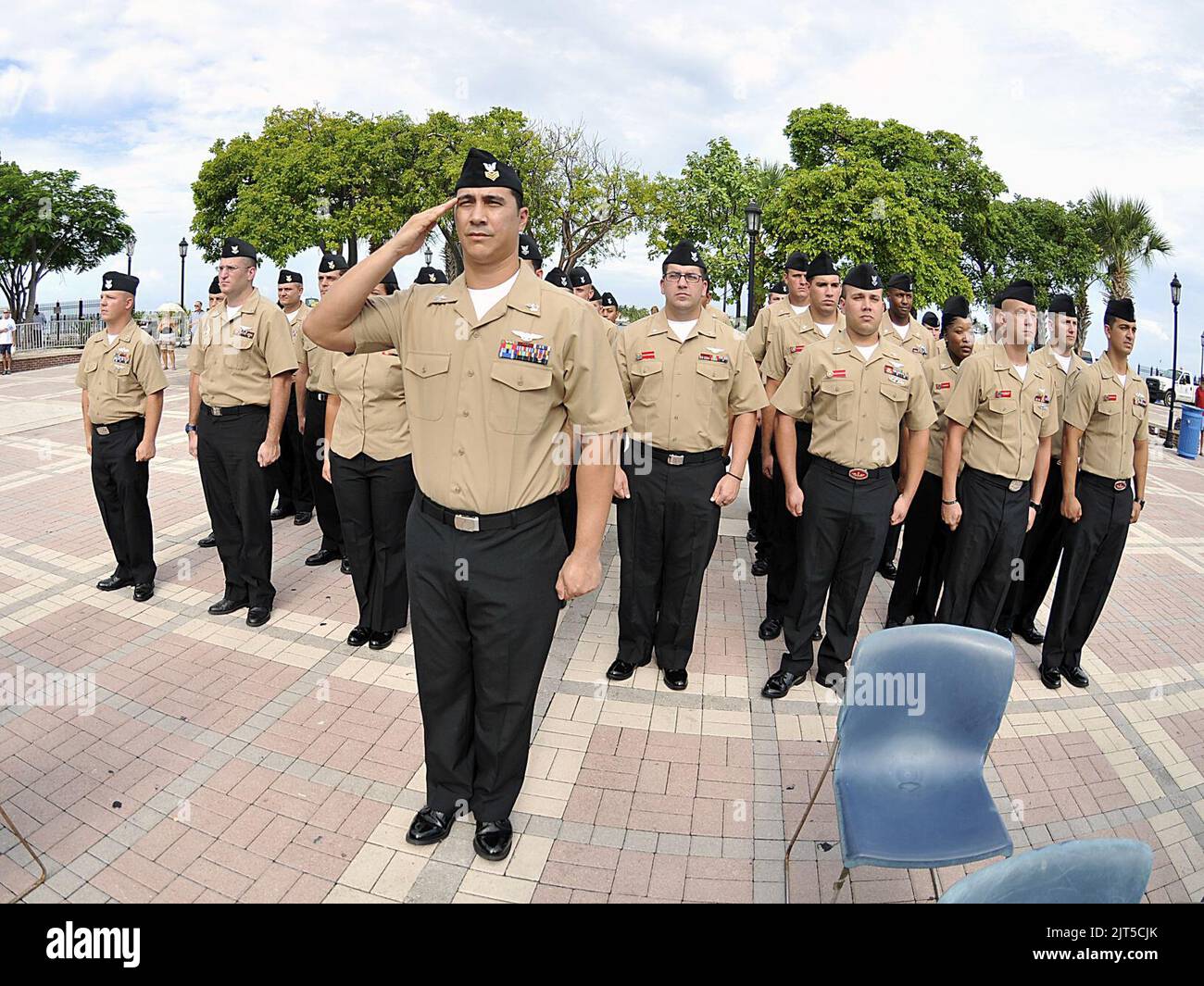 U.S. Sailors render honors during a 9-11 remembrance ceremony at the ...