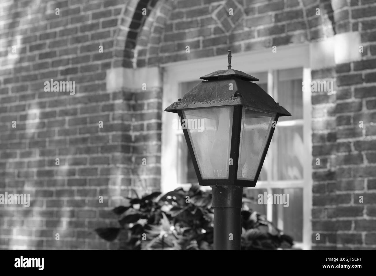 Simple typical common cast iron gas light in a black and white ...