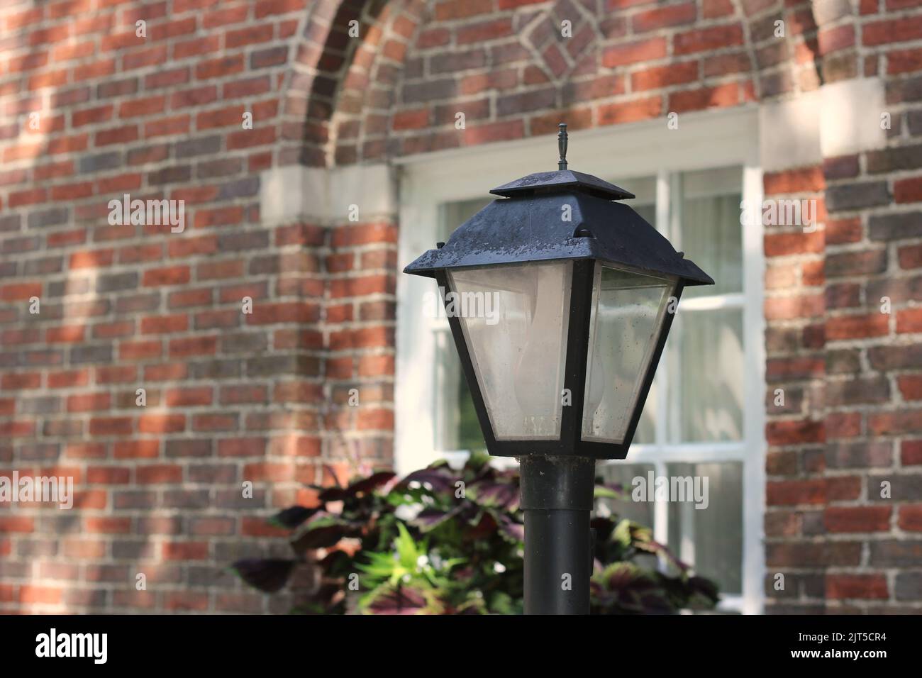 Simple typical common cast iron gas light Stock Photo - Alamy