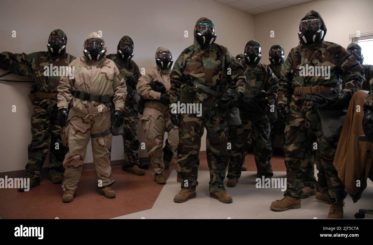 U.S. Sailors with Naval Mobile Construction Battalion (NMCB) 25 receive ...