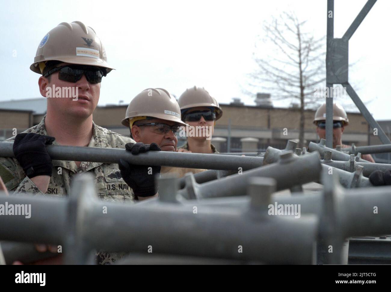 U.S. Sailors with Naval Mobile Construction Battalion (NMCB) 25 and ...