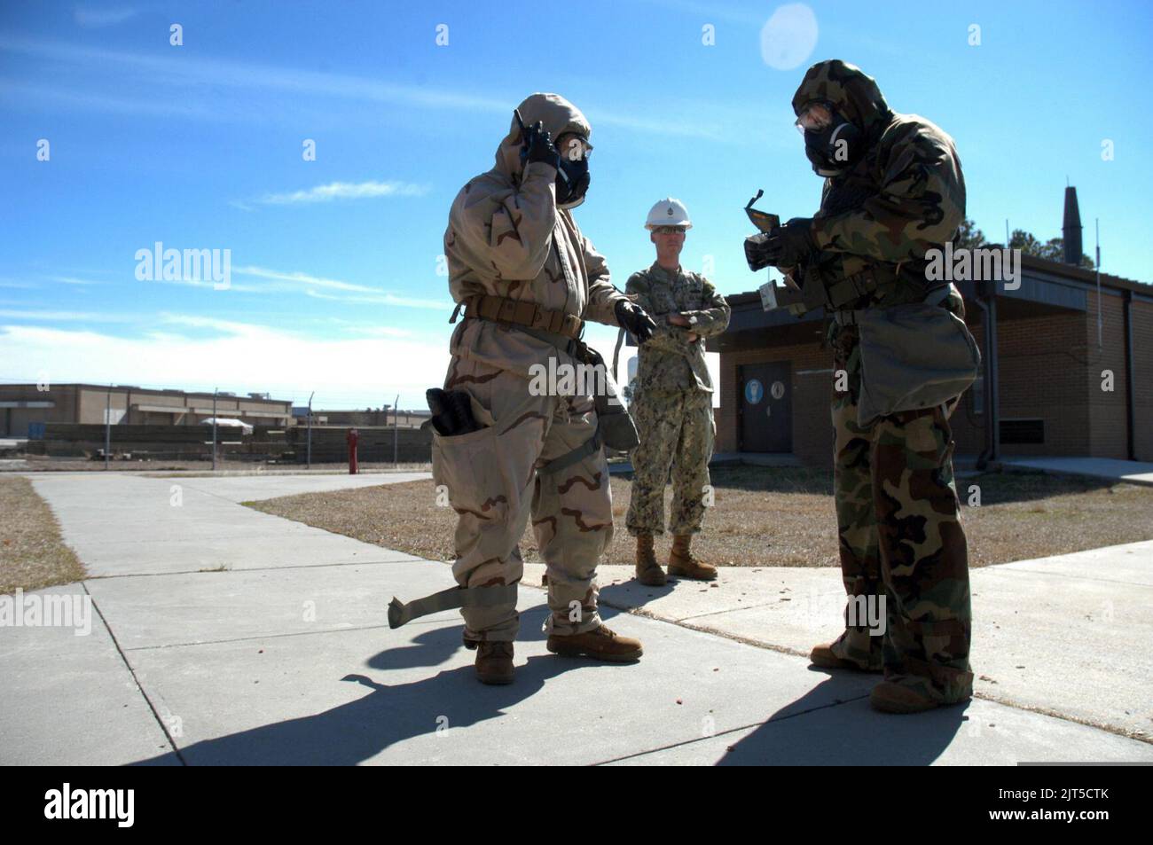U.S. Sailors with Naval Mobile Construction Battalion (NMCB) 25 prepare ...