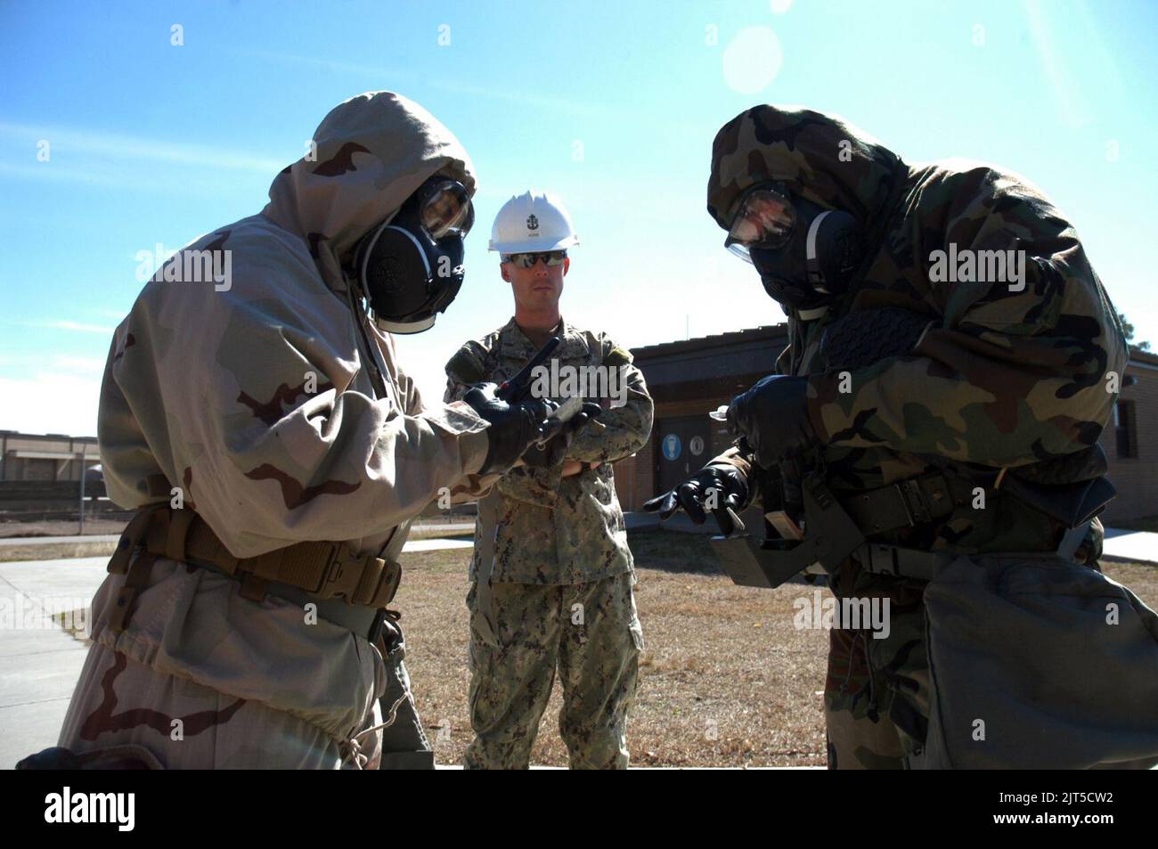 U.S. Sailors with Naval Mobile Construction Battalion (NMCB) 25 prepare ...
