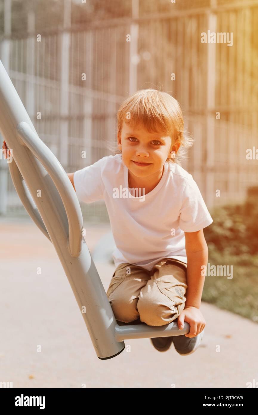 Little boy on carousel hi-res stock photography and images - Alamy