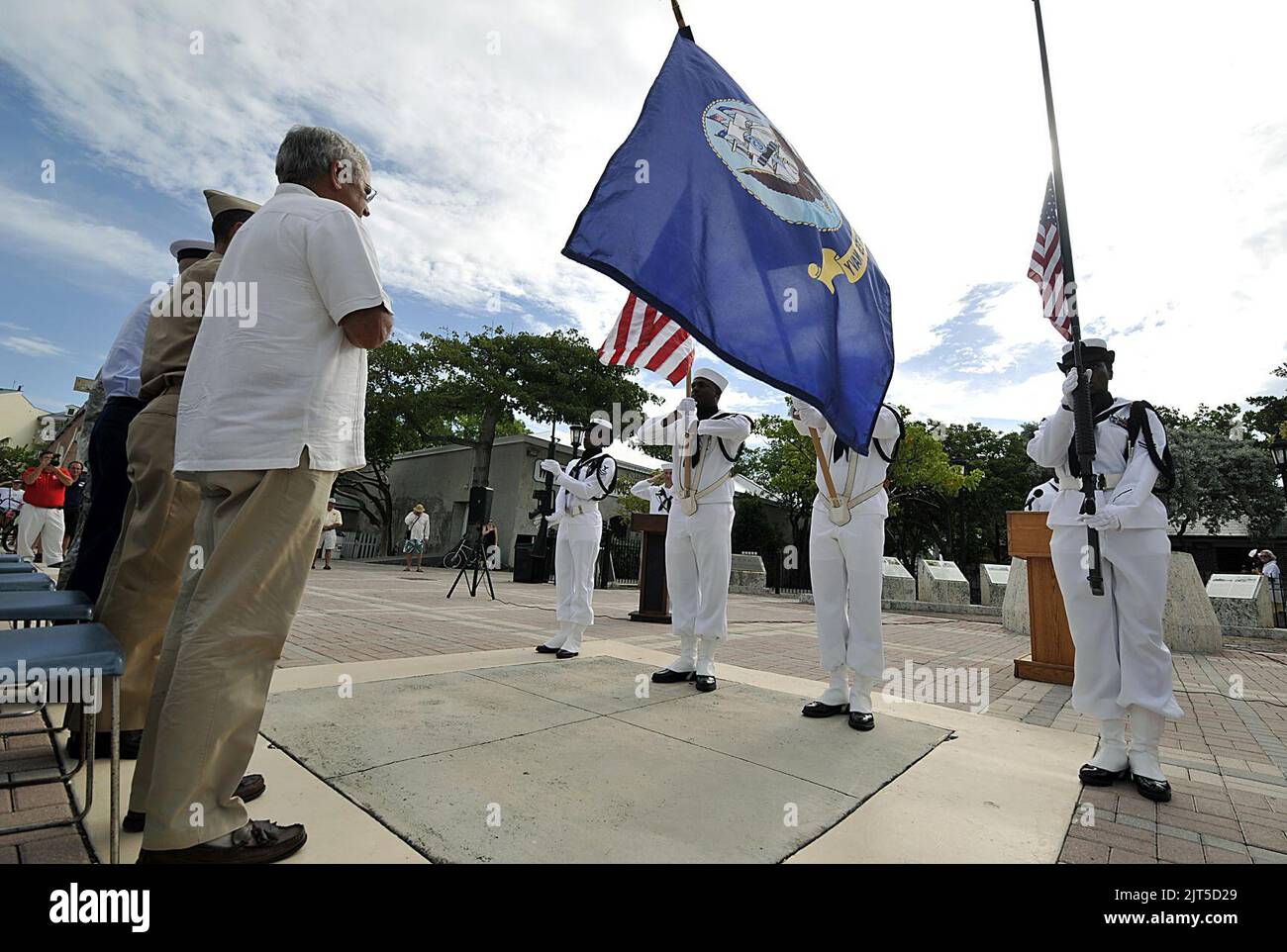 U.S. Sailors with the Naval Air Station Key West Honor Guard parade the ...
