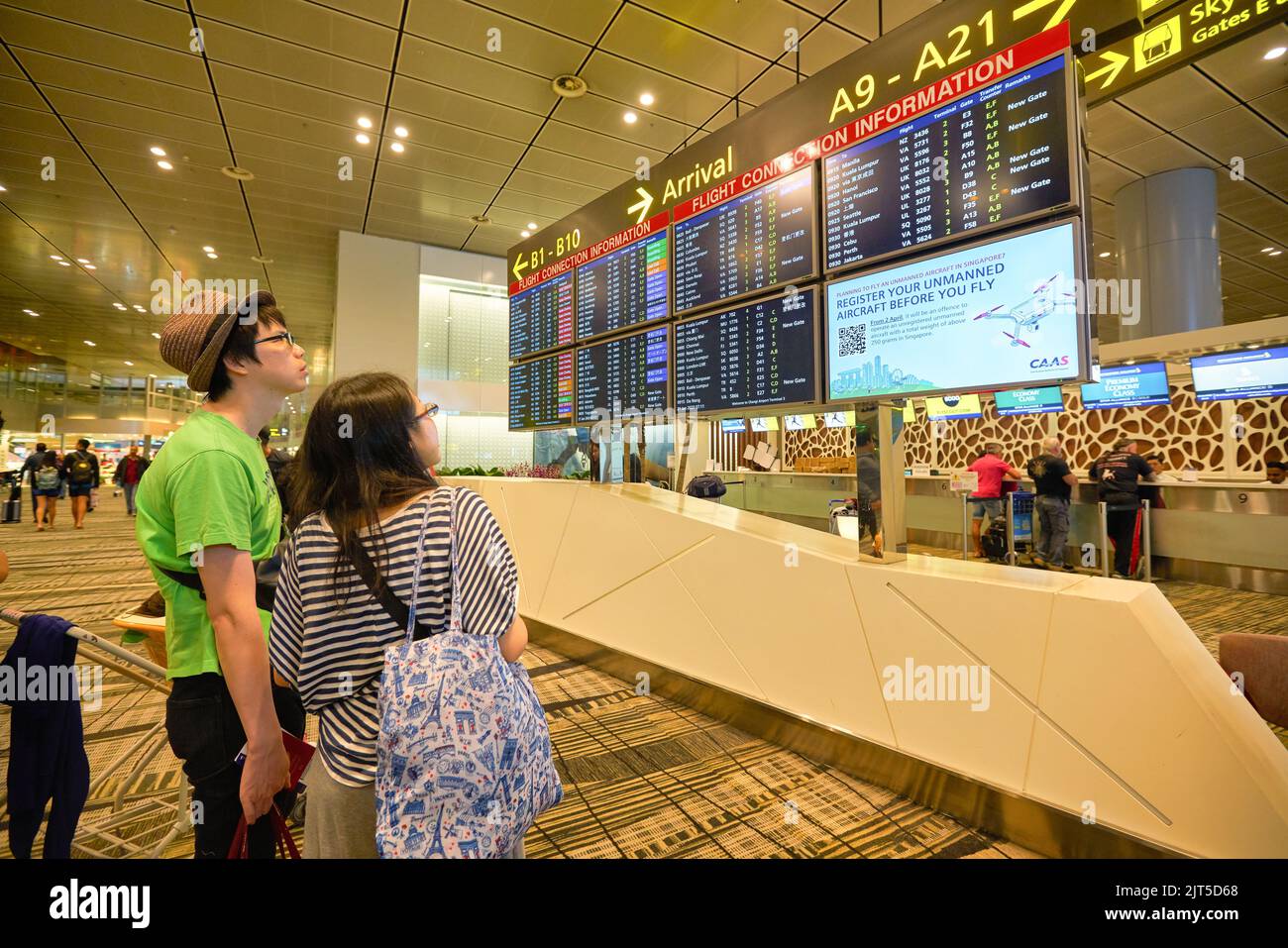 SINGAPORE - CIRCA JANUARY, 2020: flight connection information board ...