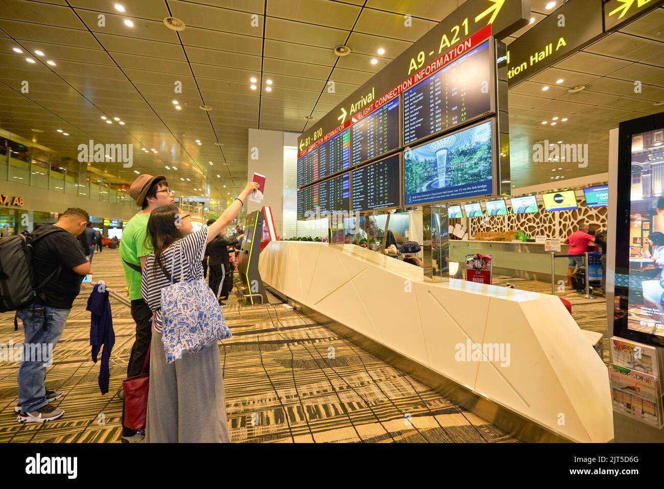 SINGAPORE - CIRCA JANUARY, 2020: flight connection information board ...