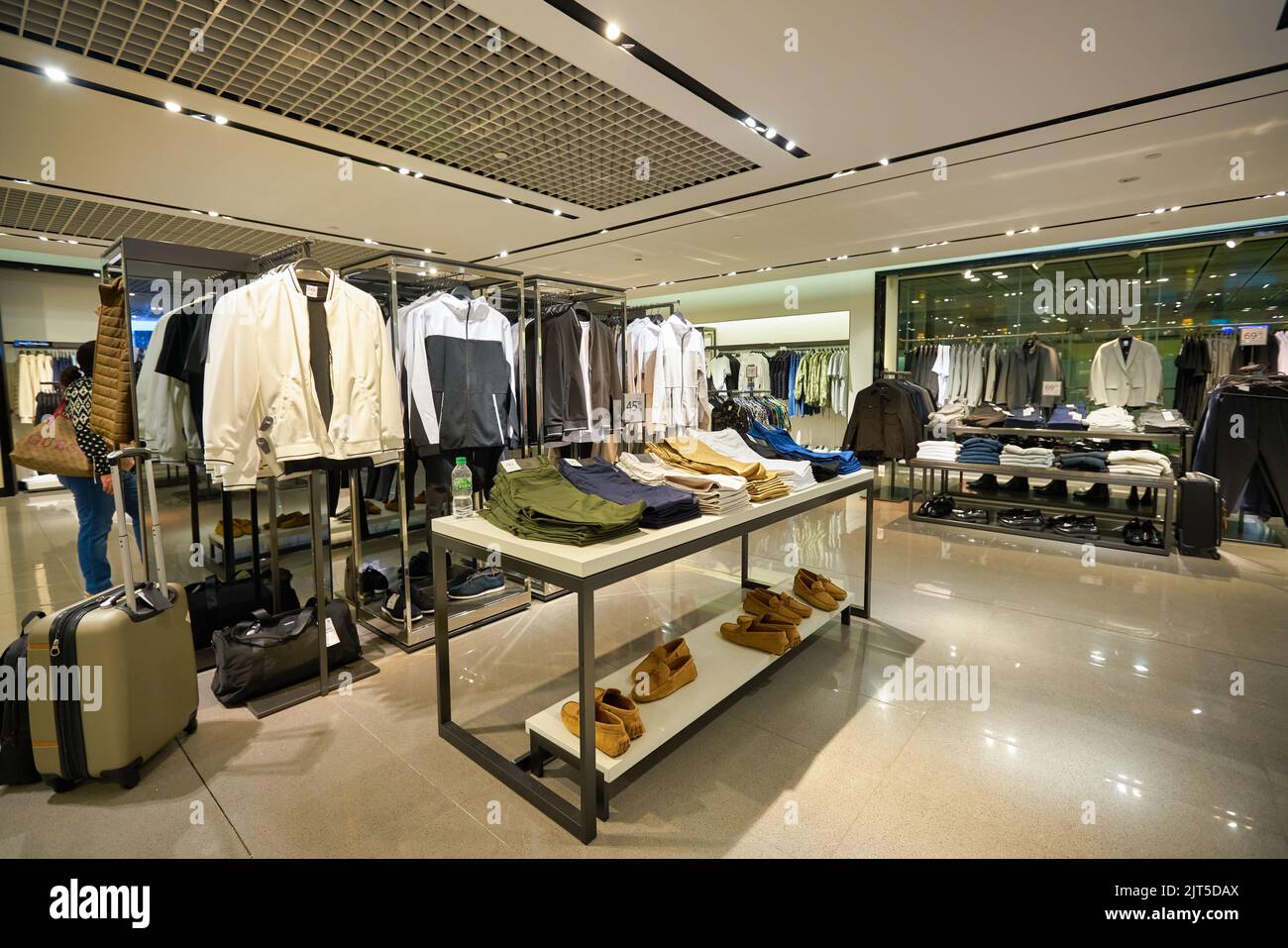 SINGAPORE - CIRCA JANUARY, 2020: clothes on display at Zara store in ...