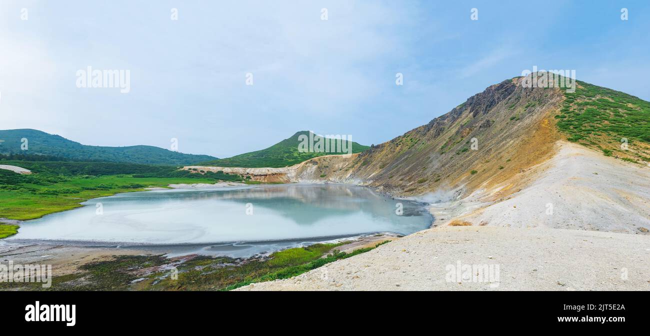 volcanic landscape, thermal hot mineralized lake at the bottom of ...